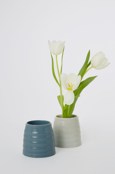 Ripple-designed cylindrical mini vase, stylishly made for a small ...