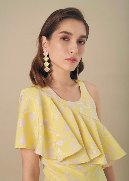 Mini dress. It has a diagonal ruffle detail across one shoulder and the ...